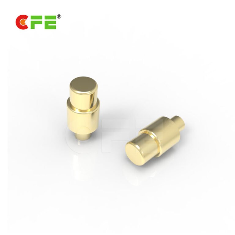 Through hole spring loaded electrical contact pins